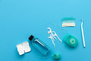 Floss With a Permanent Retainer | Peterson Family Ortho