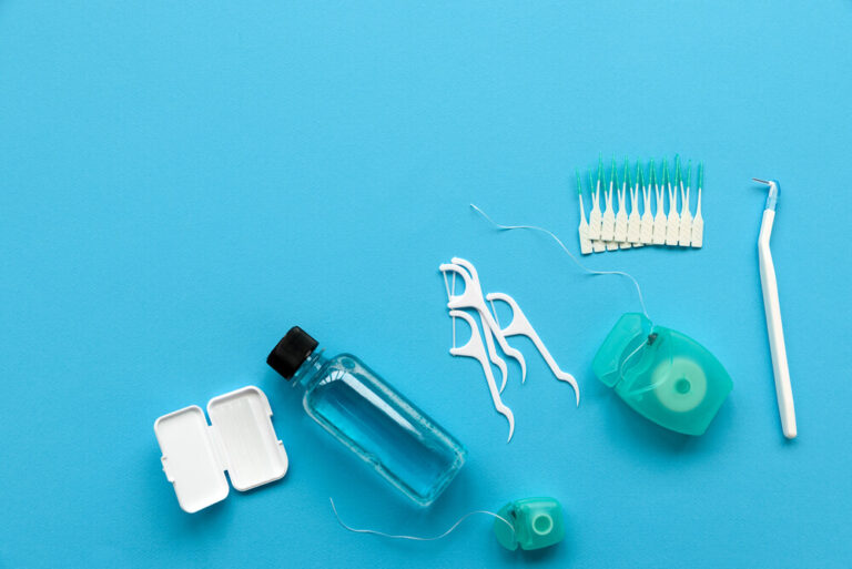 Floss With a Permanent Retainer | Peterson Family Ortho
